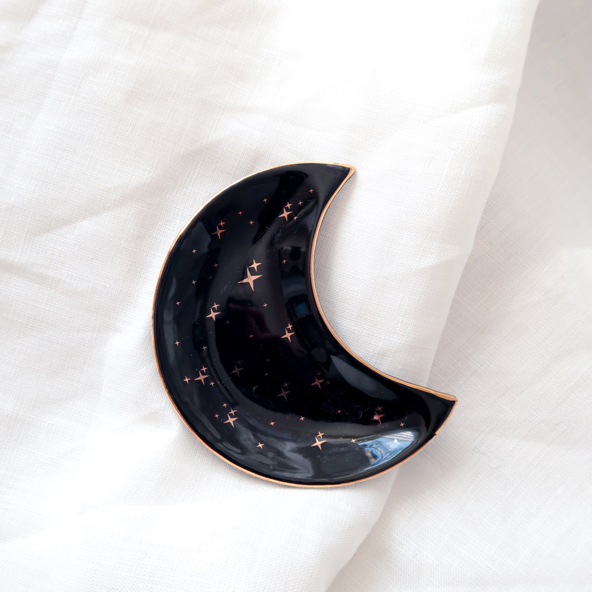 black crescent moon shape